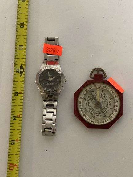 Fossil/Biomet watch & Compass - Metzger Property Services, LLC