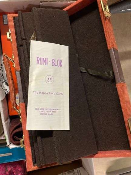 Board games, Rumi Blok game, dice, books - Metzger Property Services, LLC