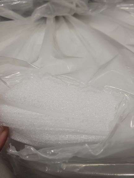 White roll of foam packing sheets 50" - Metzger Property Services, LLC
