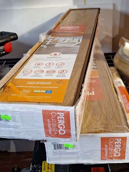 Pergo laminate flooring 8 planks 19.63sq.ft. per box - Metzger Property ...