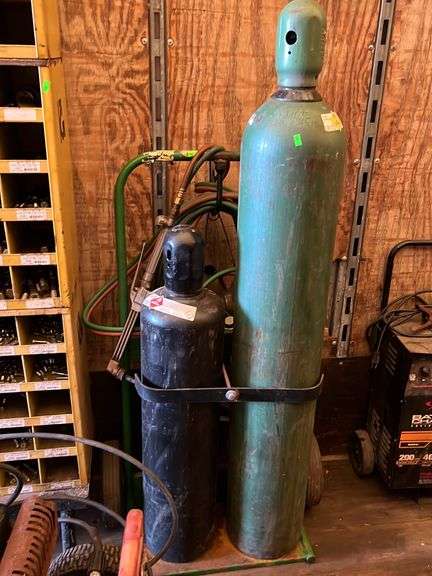 Torch outfit with oxygen and acetylene tanks, Harris gagues and Smith ...