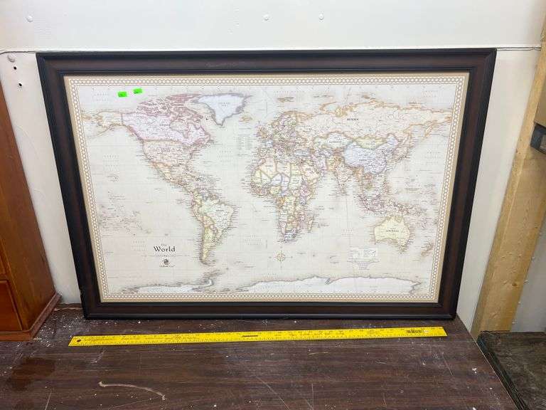 Framed world map - Metzger Property Services, LLC
