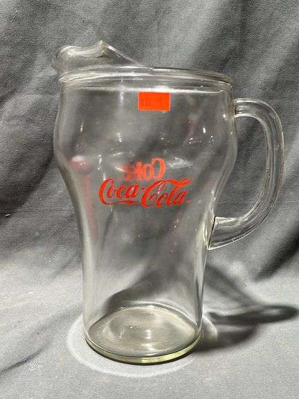 Clear glass Coca-Cola pitcher 9” - Metzger Property Services, LLC
