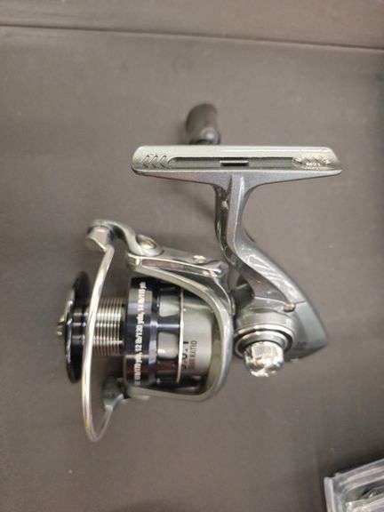 Bass Pro Shops Power Lock Fishing reel - Metzger Property Services, LLC