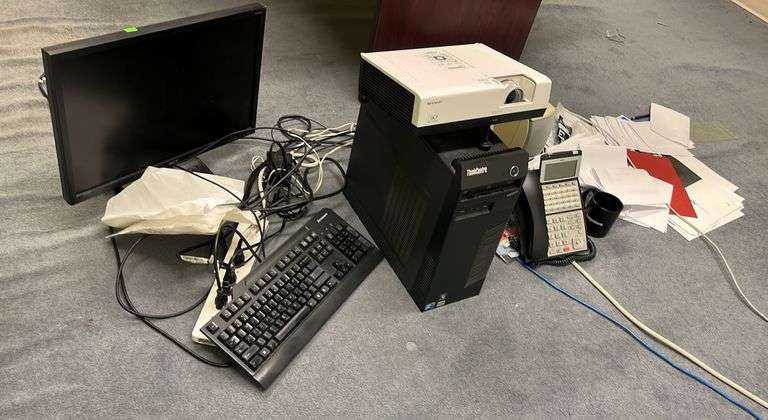 Sharp projector, computer tower, computer monitor, keyboard, phone and ...