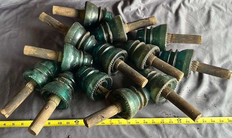 12 Green glass insulators Hemingray with wood mounts & 1 petticoat ...