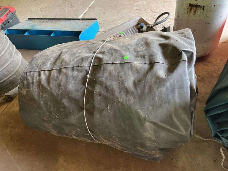 Large tarp unknown size - Metzger Property Services, LLC