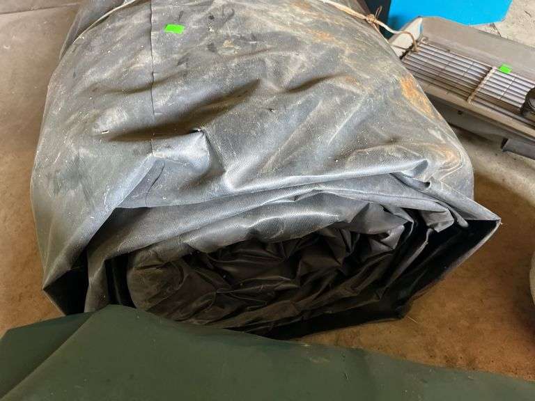 Large tarp unknown size - Metzger Property Services, LLC