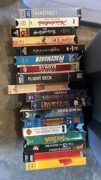 VHS and DVD movie assortment in tote with lid - Metzger Property ...
