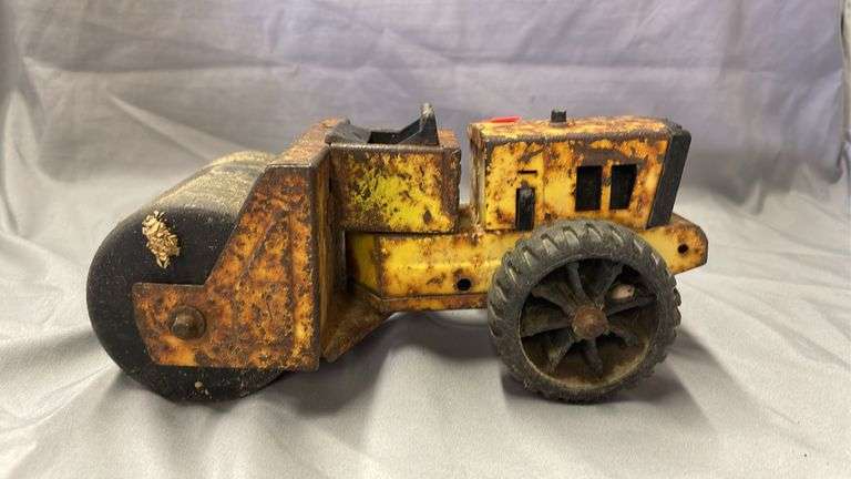 Tonka roller machine model (rust damage) - Metzger Property Services, LLC