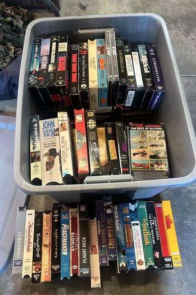 VHS and DVD movie assortment in tote with lid - Metzger Property ...