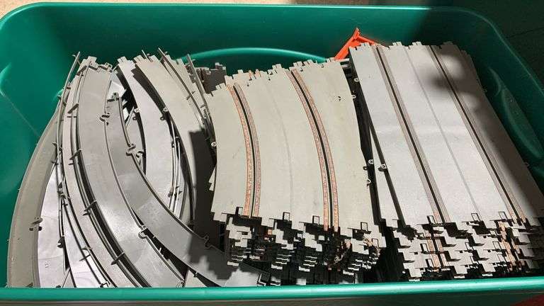 Plastic Tote, train track assortment - Metzger Property Services, LLC