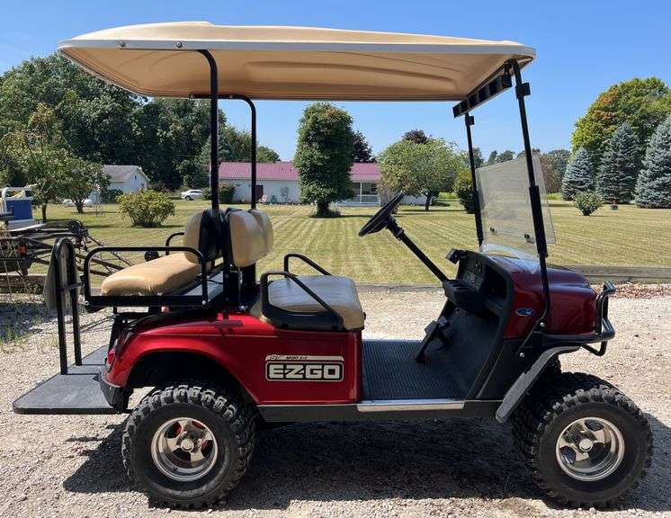 EZGo sport 2+2 gas golf cart with lift kit - Metzger Property Services, LLC