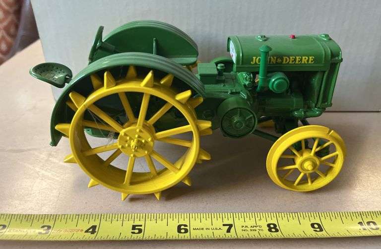 John Deere Model D Tractor 1/16 scale - Metzger Property Services, LLC