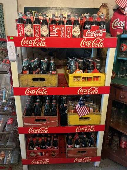 Plastic Coca-Cola display rack, wood crates and Coca-Cola bottle, cans ...