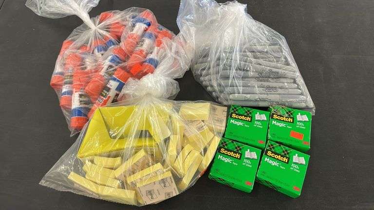 Scotch tape, silver sharpies, post it notes, elmers glue sticks ...