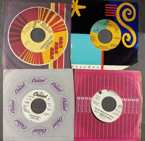 50+ 45 RPM vinyl records including Dolly Parton, Jimmy Dean, Merle ...