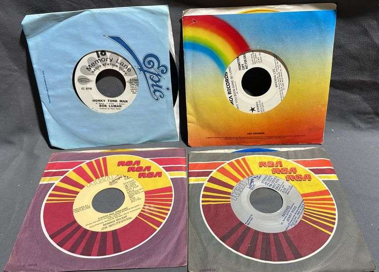 50+ 45 RPM vinyl records including Reba McEntire, Jerry Reed, Ronnie ...