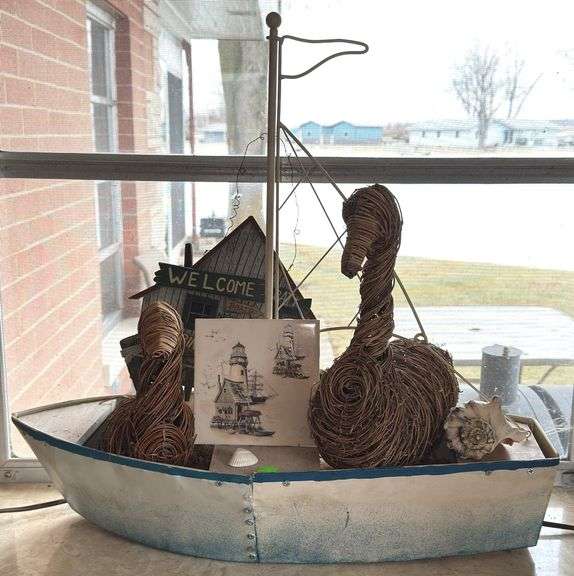 Metal boat and decor 26” - Metzger Property Services, LLC