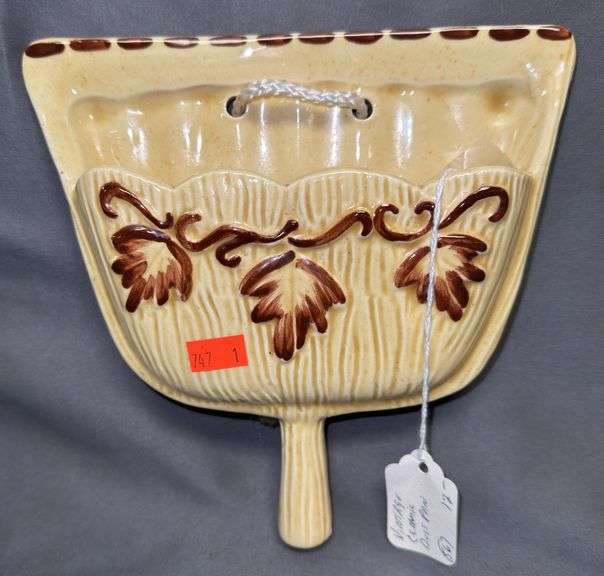 Ceramic dust pan - Metzger Property Services, LLC