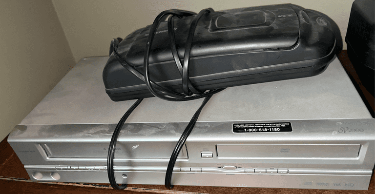 AV2000 DVD/VHS Player and Magnavox VHS Tape Rewinder - Metzger Property ...