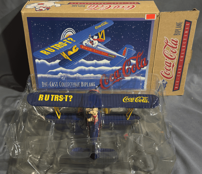 Coca-Cola Die Cast Biplane Collectible - Metzger Property Services, LLC