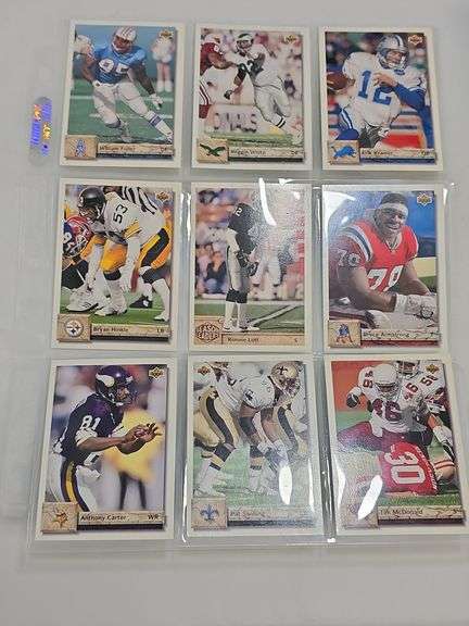 Stamp and Football Card Assortment - Metzger Property Services, LLC