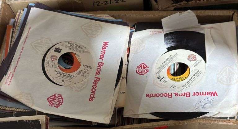 50+ 45 RPM vinyl records including Eddie rabbitt, Kenny rogers, Ronnie ...