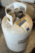 Empty propane tank - Metzger Property Services, LLC