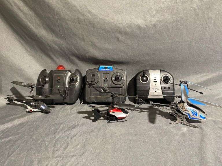 3 Remote Control Helicopters with Controllers inc. Propel RC and Silver ...