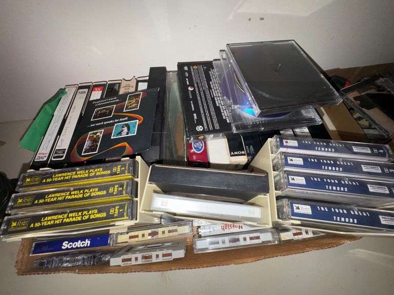 Audio Cassettes and Compact Discs with Storage Cases - Metzger Property ...