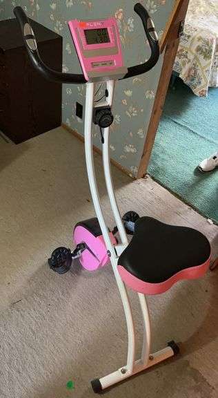 Pink & white Pleny exercise bike, located on upstairs landing - Metzger ...