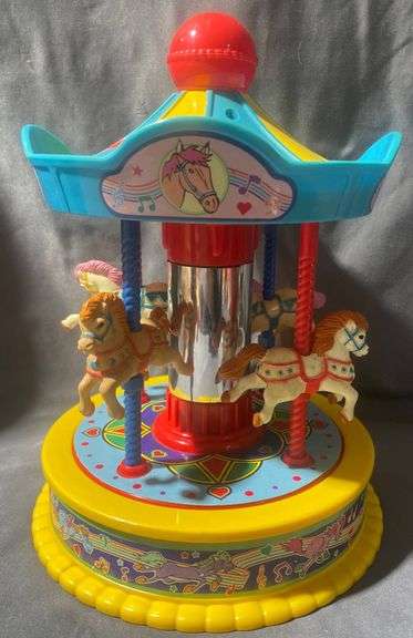 Plastic Carousel Toy with Rotating Horses by Schylling, Inc. 7”x11 ...