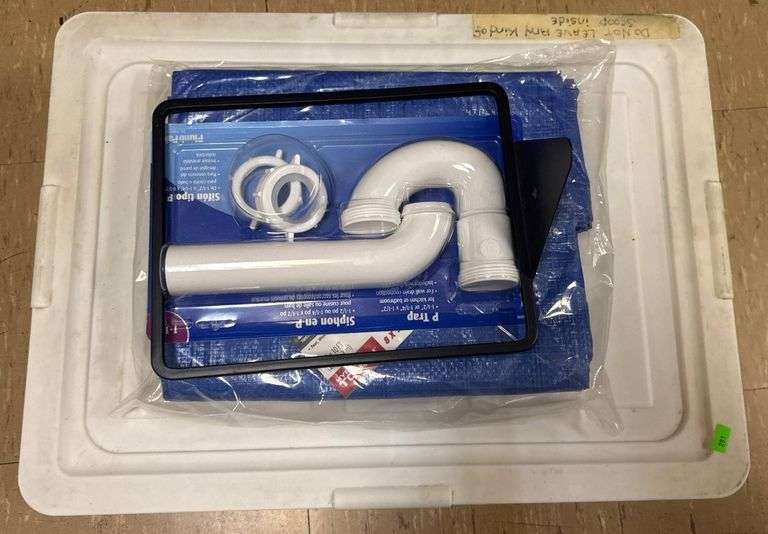 Plastic Storage Container with Plumbing Parts and Tarp - Metzger ...