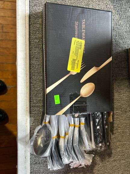 48-Piece Stainless Steel Tableware Inc. Knives, Forks and Spoons ...