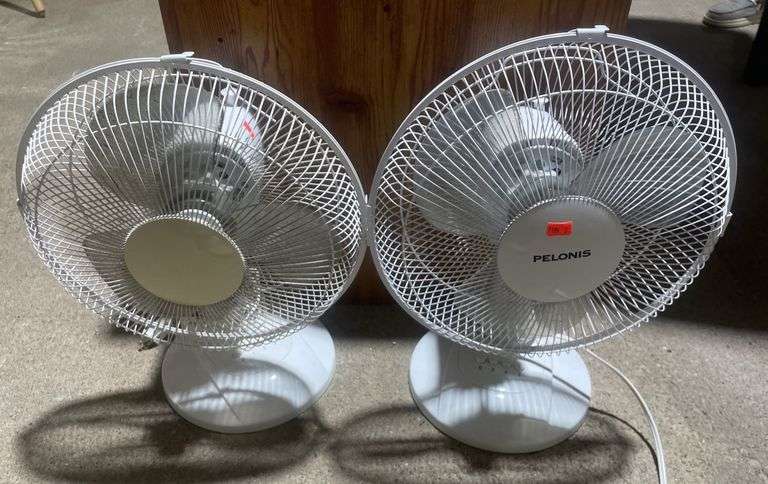 (2) small electric fans - Metzger Property Services, LLC
