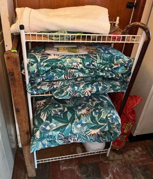 Wire shelving unit w/ contents inc. cushions, wood folding chair ...