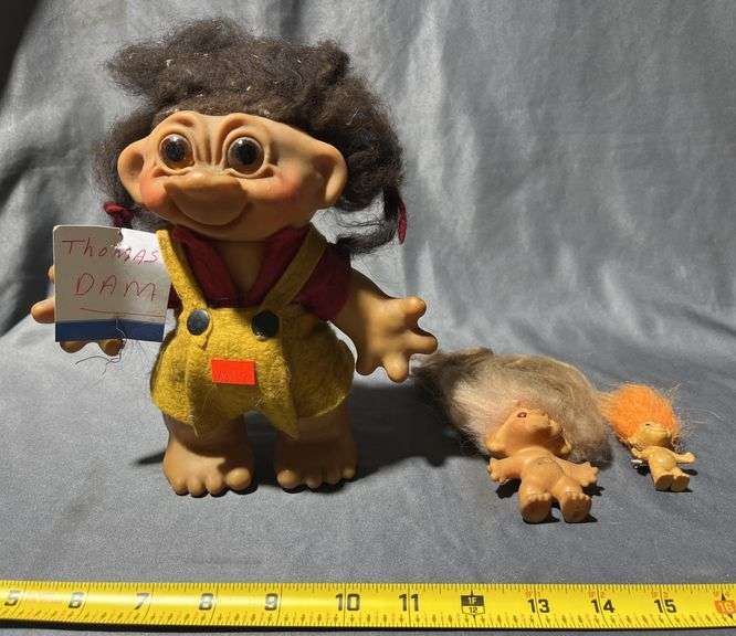 (3) troll dolls (visible wear) - Metzger Property Services, LLC