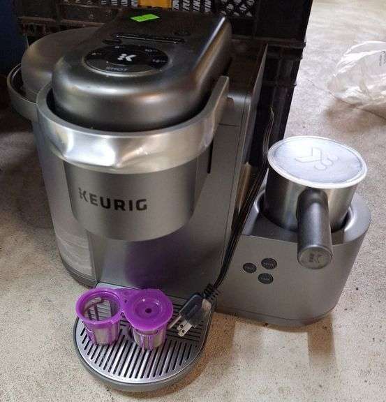 Keurig coffee/latte maker - Metzger Property Services, LLC