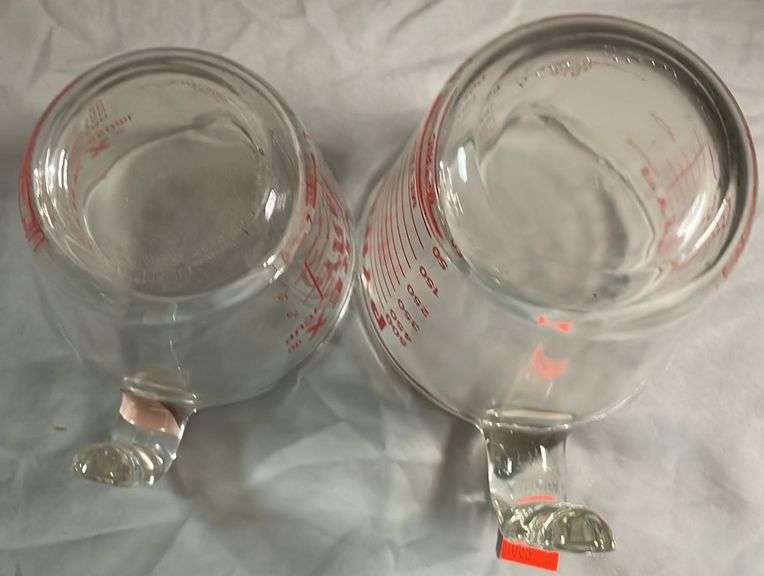 (2) Pyrex glass measuring cups - Metzger Property Services, LLC