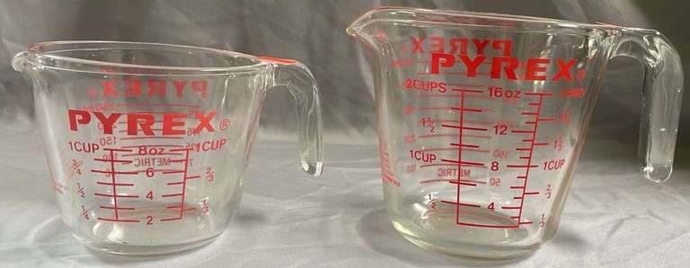 (2) Pyrex glass measuring cups - Metzger Property Services, LLC