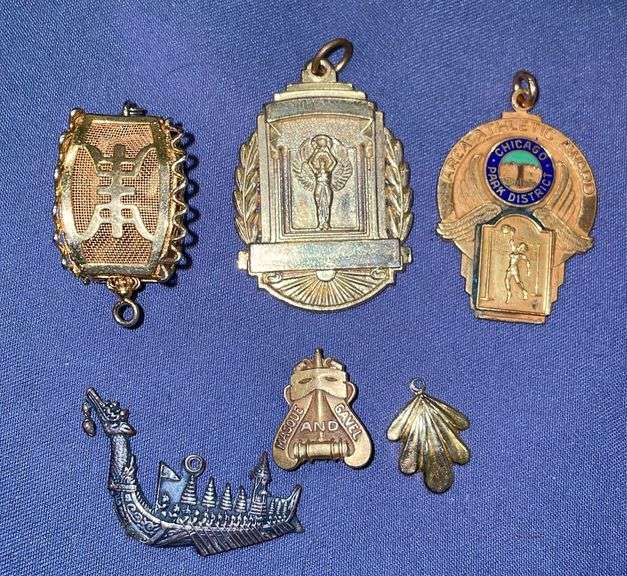 (6) Gold toned metal pendants - Metzger Property Services, LLC