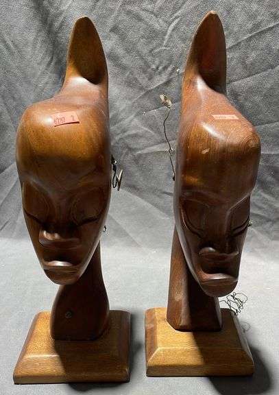 (2) Wood carved statues 13”H - Metzger Property Services, LLC