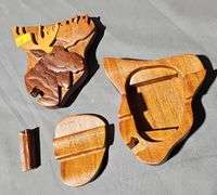 Wood Moose Puzzle Box 4" - Metzger Property Services, LLC