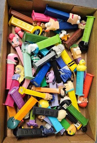 PEZ Candy Dispensers Featuring Various Characters - Metzger Property ...