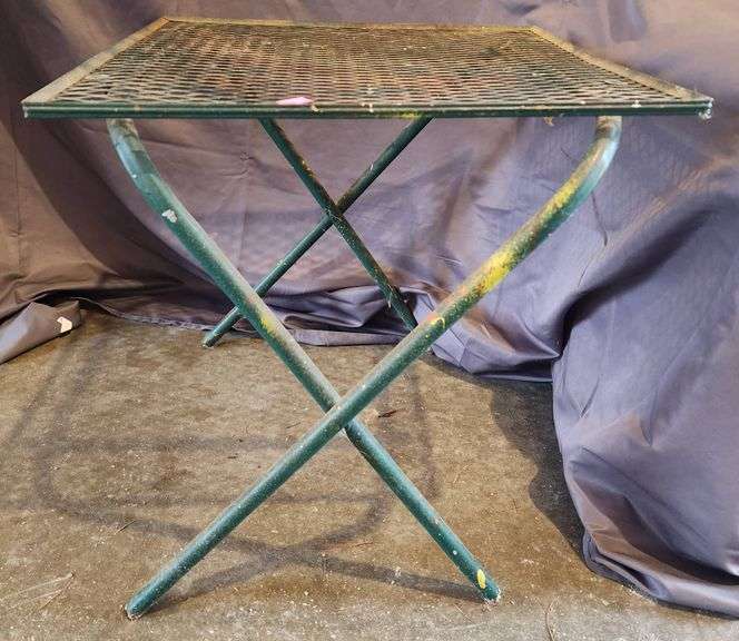 Metal Folding Table with Green Mesh Top - Metzger Property Services, LLC
