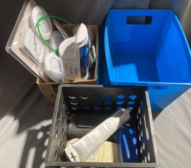 Plastic Storage Bins with Household Items and LED Puck Light Set ...