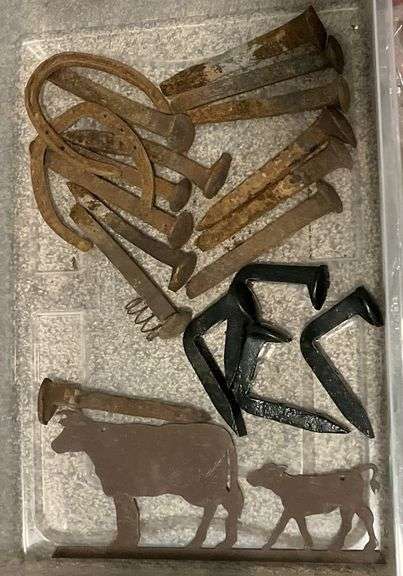 Horse shoes, railroad spikes, metal cows - Metzger Property Services, LLC