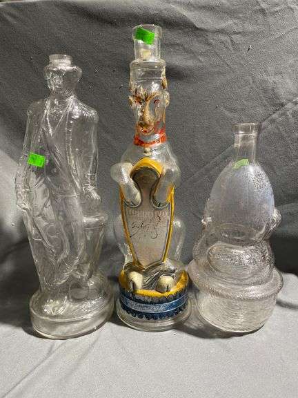 Grouping of Three Clear and Painted Glass Decanters with Figurative and ...