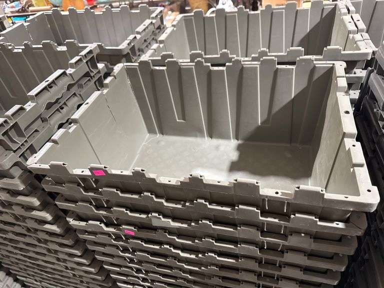 Stack of Gray Industrial Plastic Storage Bins with Interlocking Design ...